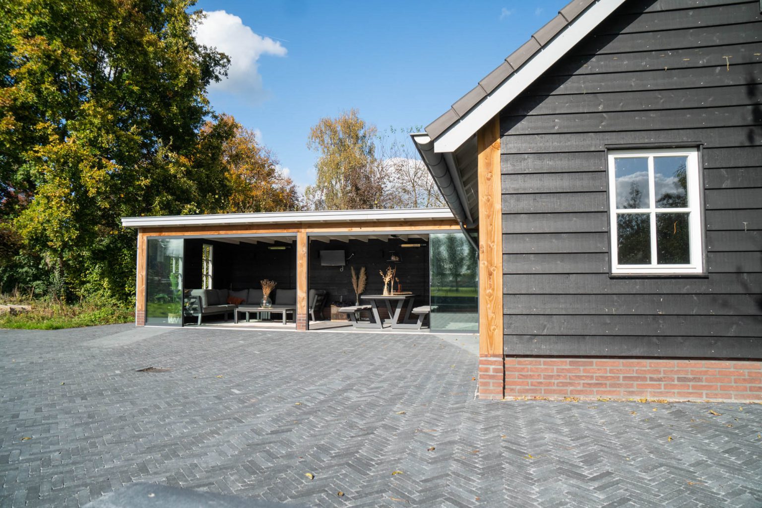 Overkapping met glas (wand) bouwen | Geldersche Houtbouw