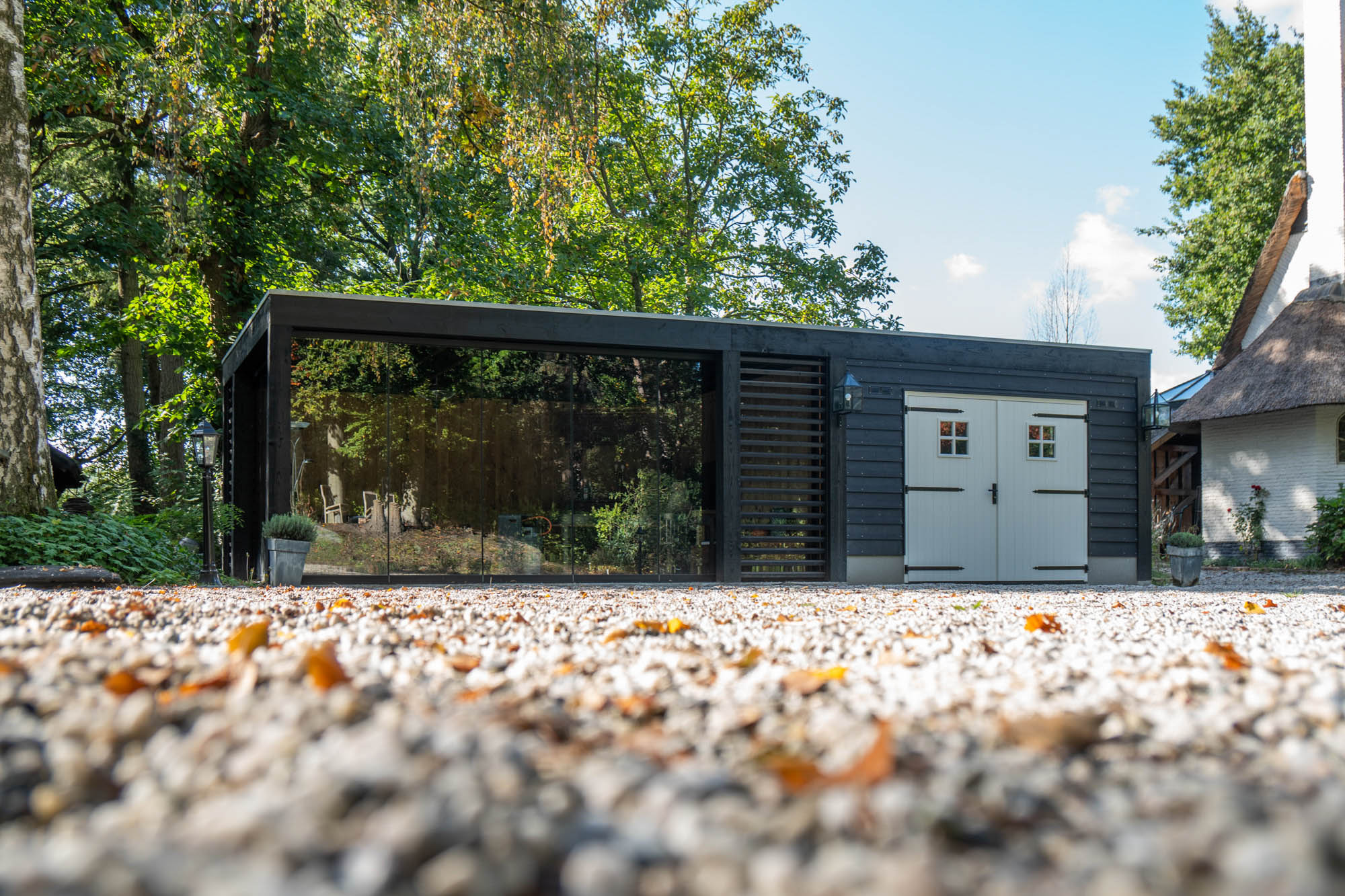 Houten garage met overkapping | Geldersche Houtbouw